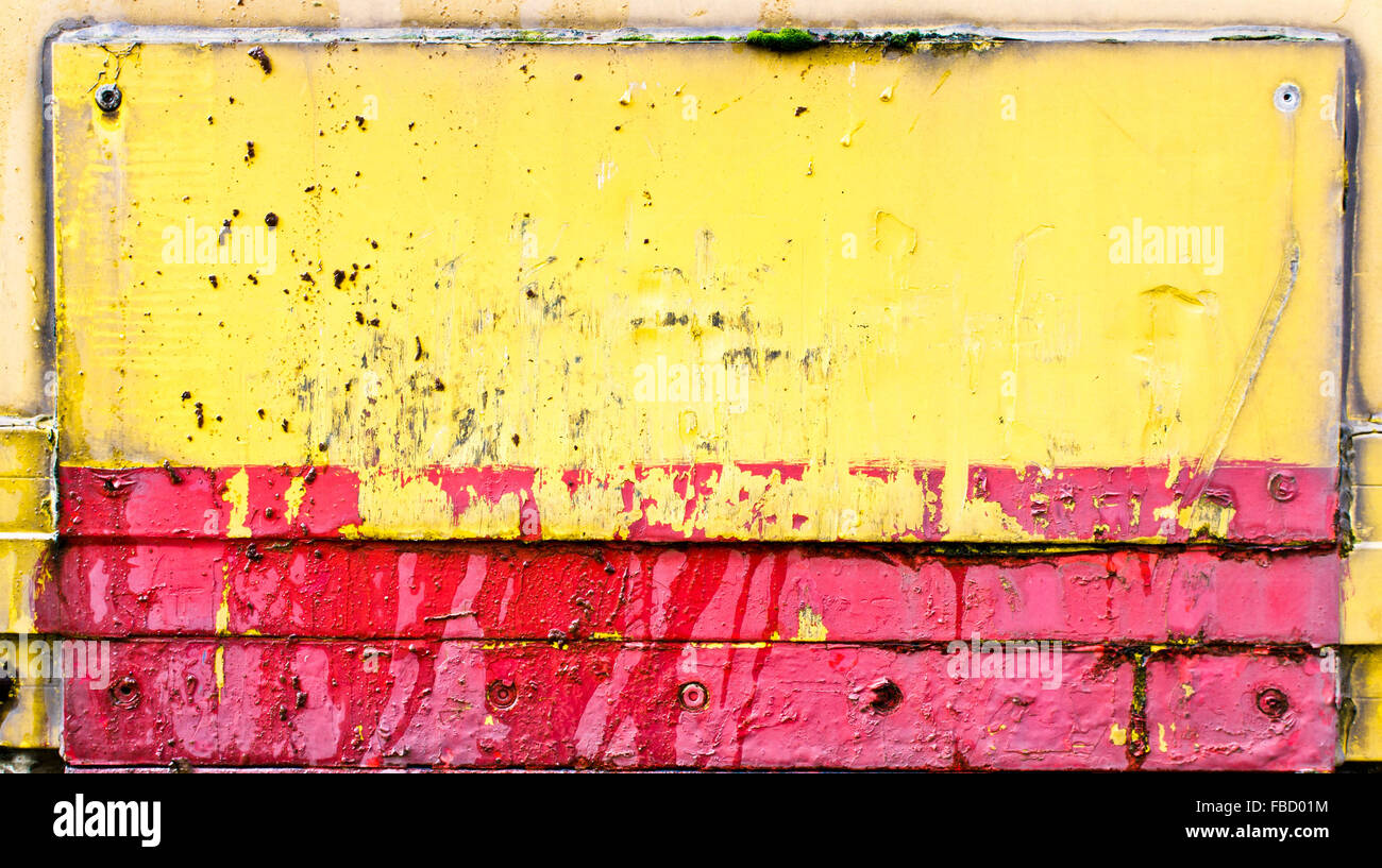 Yellow and red painted metal surface as a background texture Stock ...