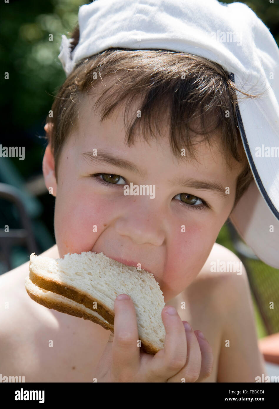 boy eating a Sandwich at a Picnic Stock Photo - Alamy