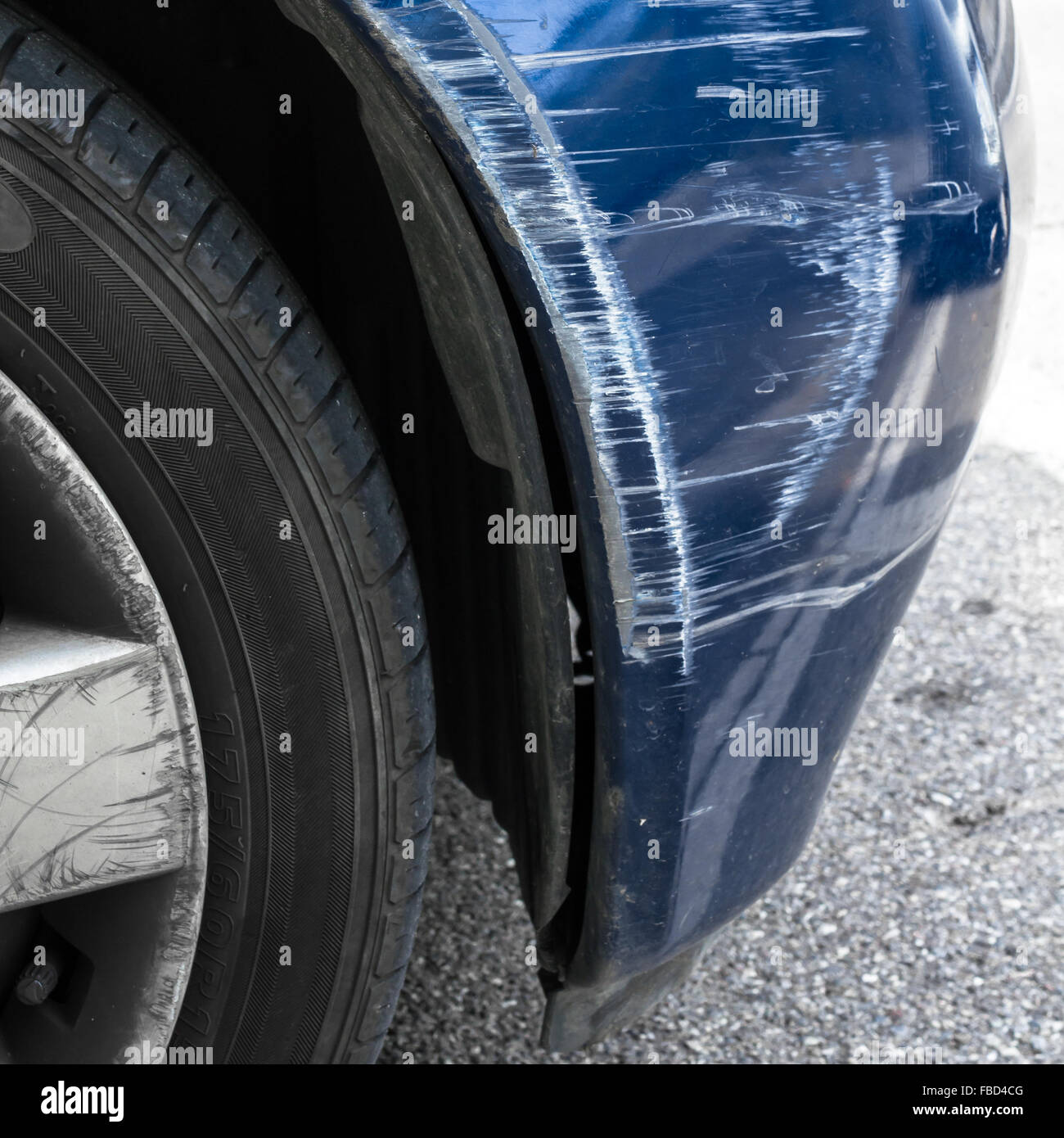 Accident damage to the front side of a blue car Stock Photo - Alamy