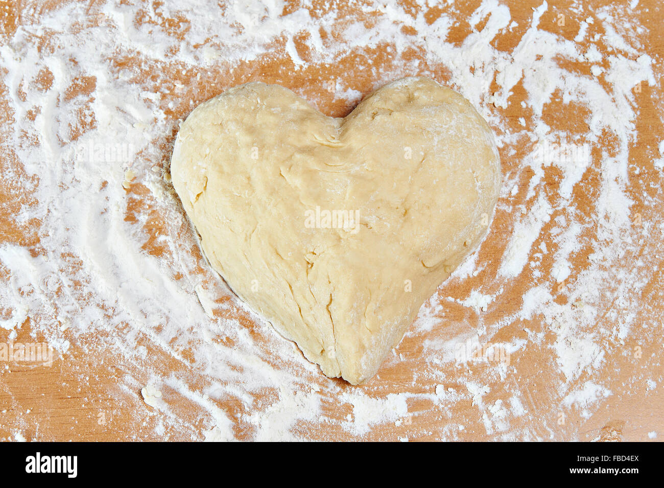 dough in form of heart as symbol love Stock Photo - Alamy