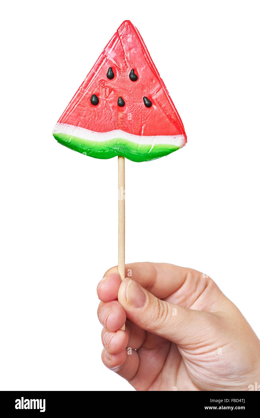 Hand holding lollipop hi-res stock photography and images - Alamy