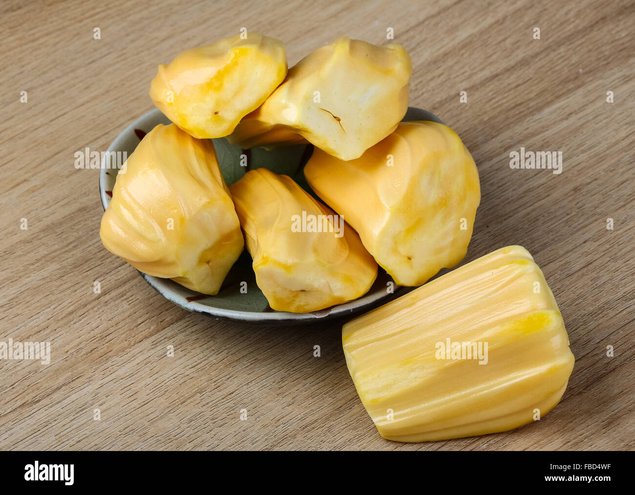 Tropical Jack Fruit on the wood background Stock Photo - Alamy