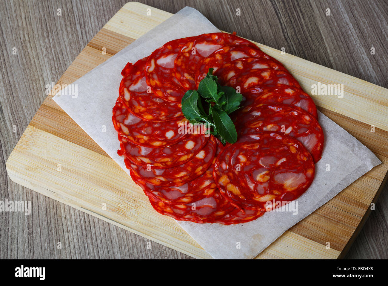 Traditional Spanish salami - Chorizo sausage on the wood background ...
