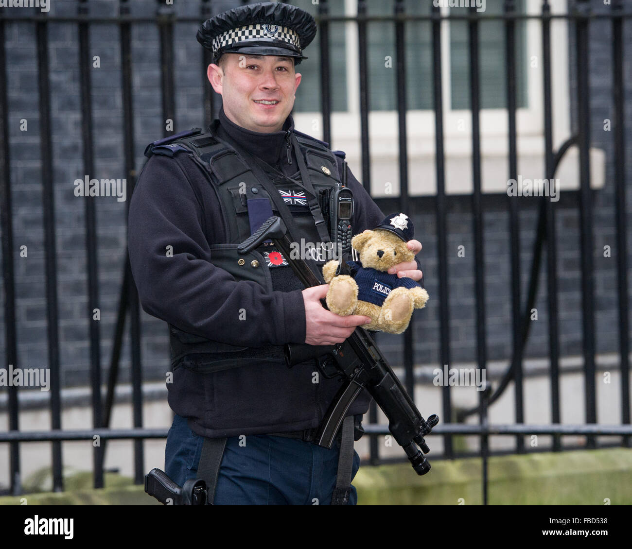 Armed police pose with 'Bobby the Bear' at Number 10 Downing Street ...