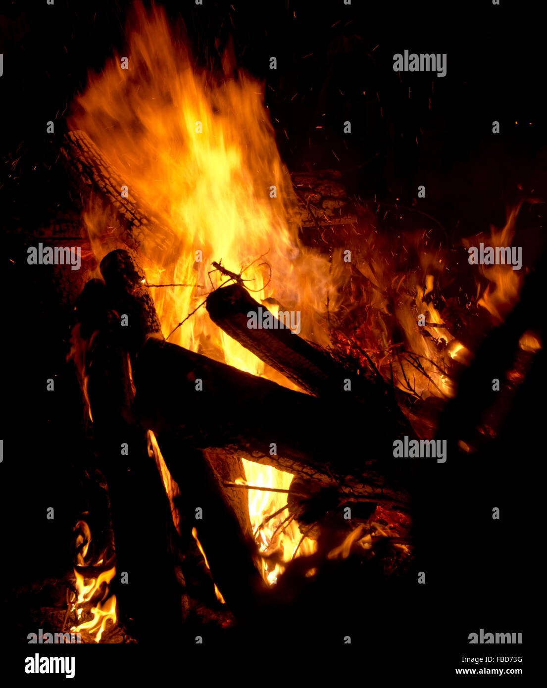 Big flame, glow and sparks of a bonfire in the night Stock Photo - Alamy