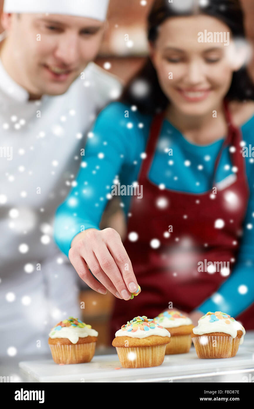 happy woman and chef cook baking in kitchen Stock Photo - Alamy