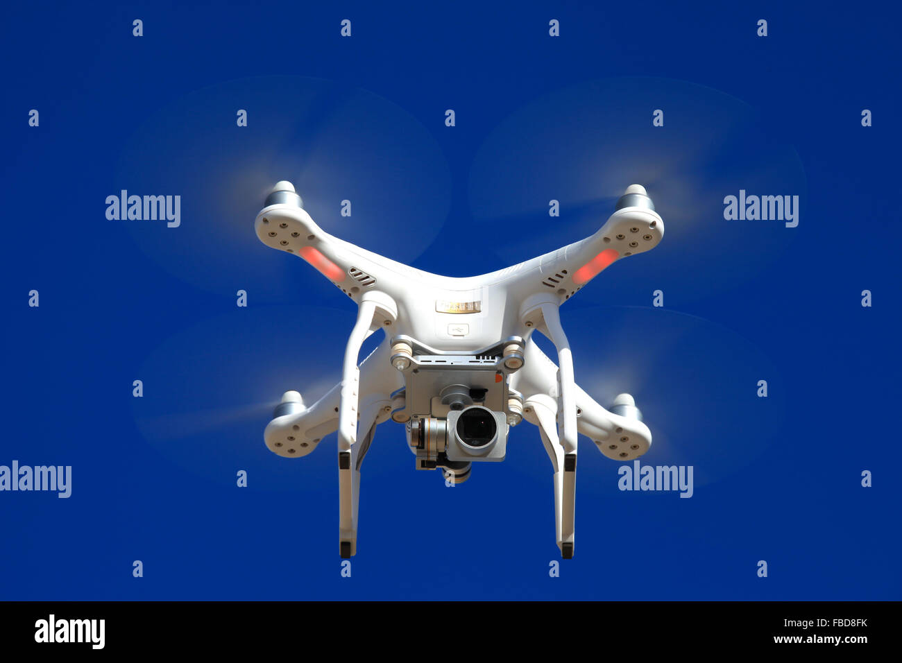 White drone equipped with high resolution 4K video camera Stock Photo ...