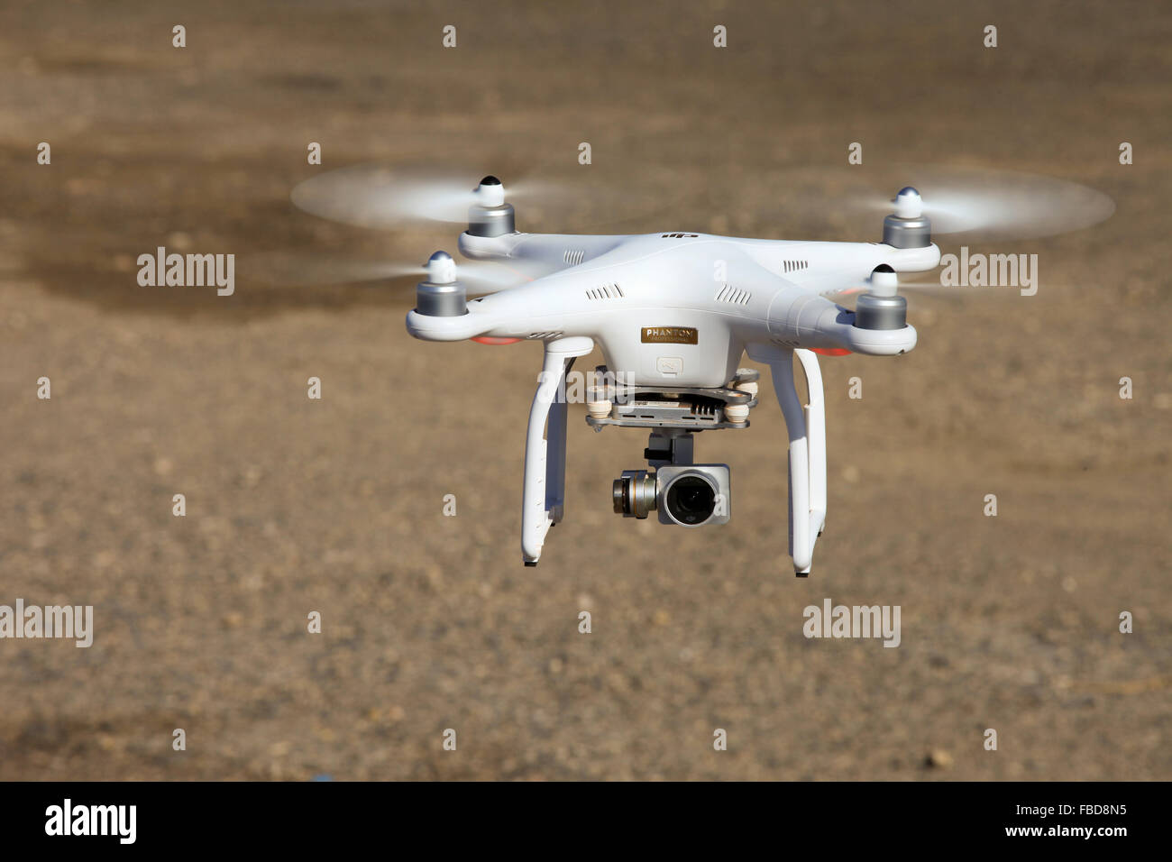 White drone equipped with high resolution 4K video camera Stock Photo ...