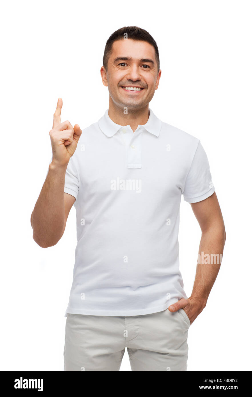 smiling man pointing finger up Stock Photo - Alamy smiling man pointing finger up Stock Photo - Alamy