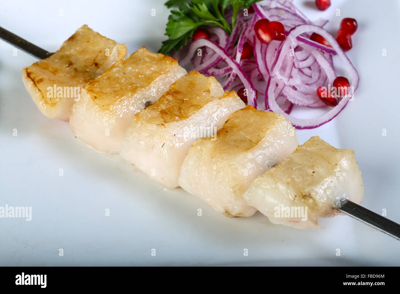 Grilled lamb fat with onion and parsley Stock Photo - Alamy