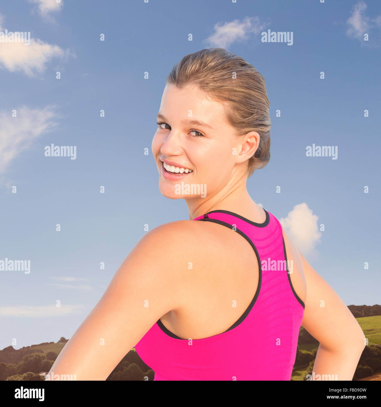 Composite image of smiling fit woman Stock Photo - Alamy