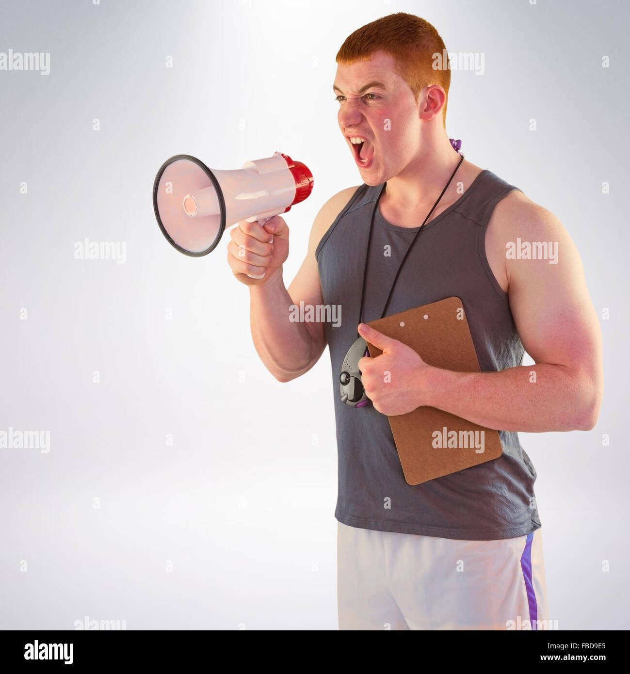 Composite image of angry personal trainer yelling through megaphone ...