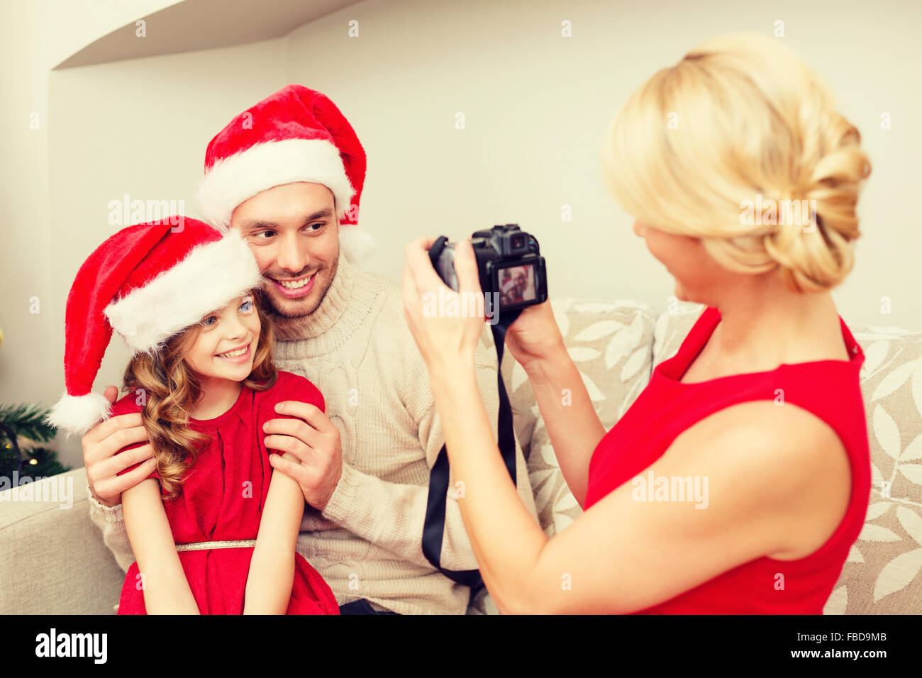 mother taking picture of father and daughter Stock Photo - Alamy