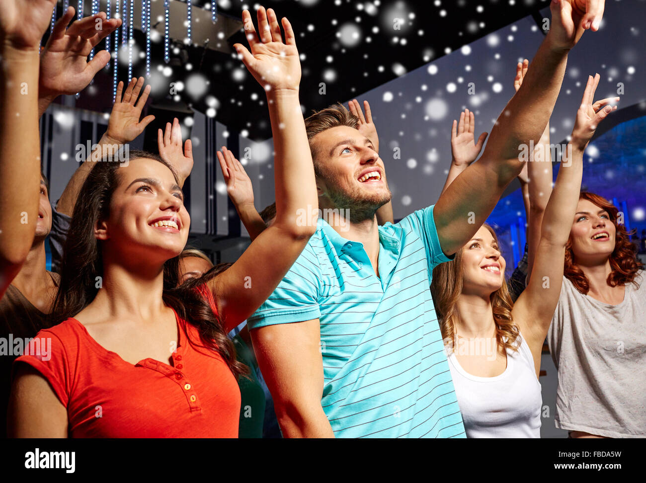 smiling friends at concert in club Stock Photo - Alamy