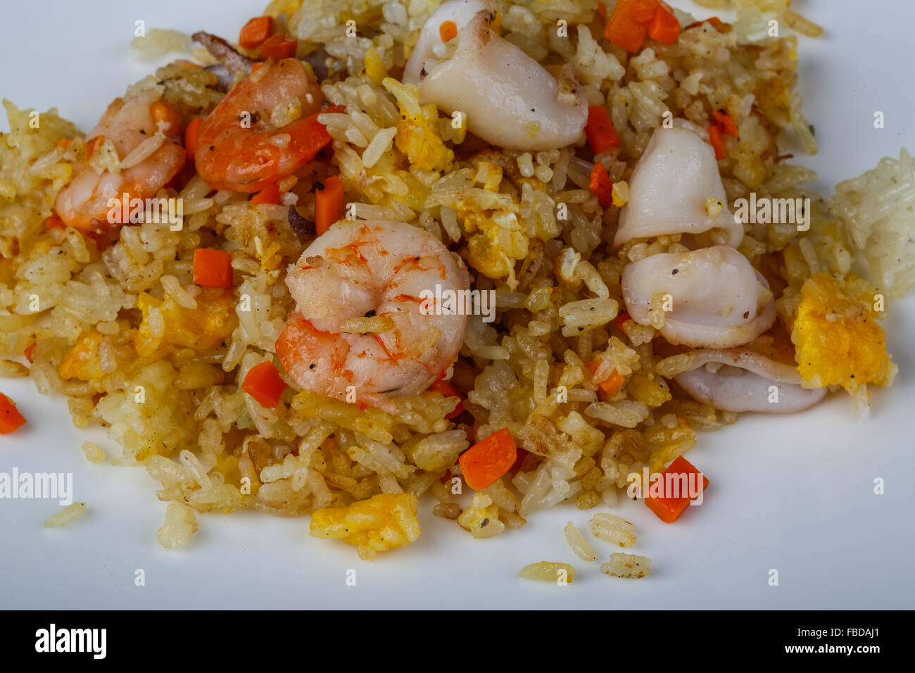 Asian traditional Fried rice with seafood on the wood background Stock ...