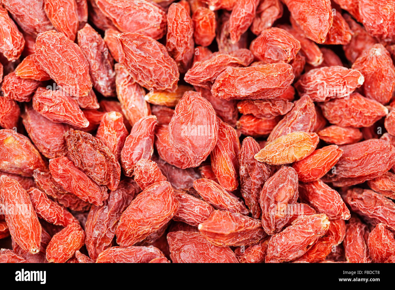 food background - dried red goji berries close up Stock Photo - Alamy