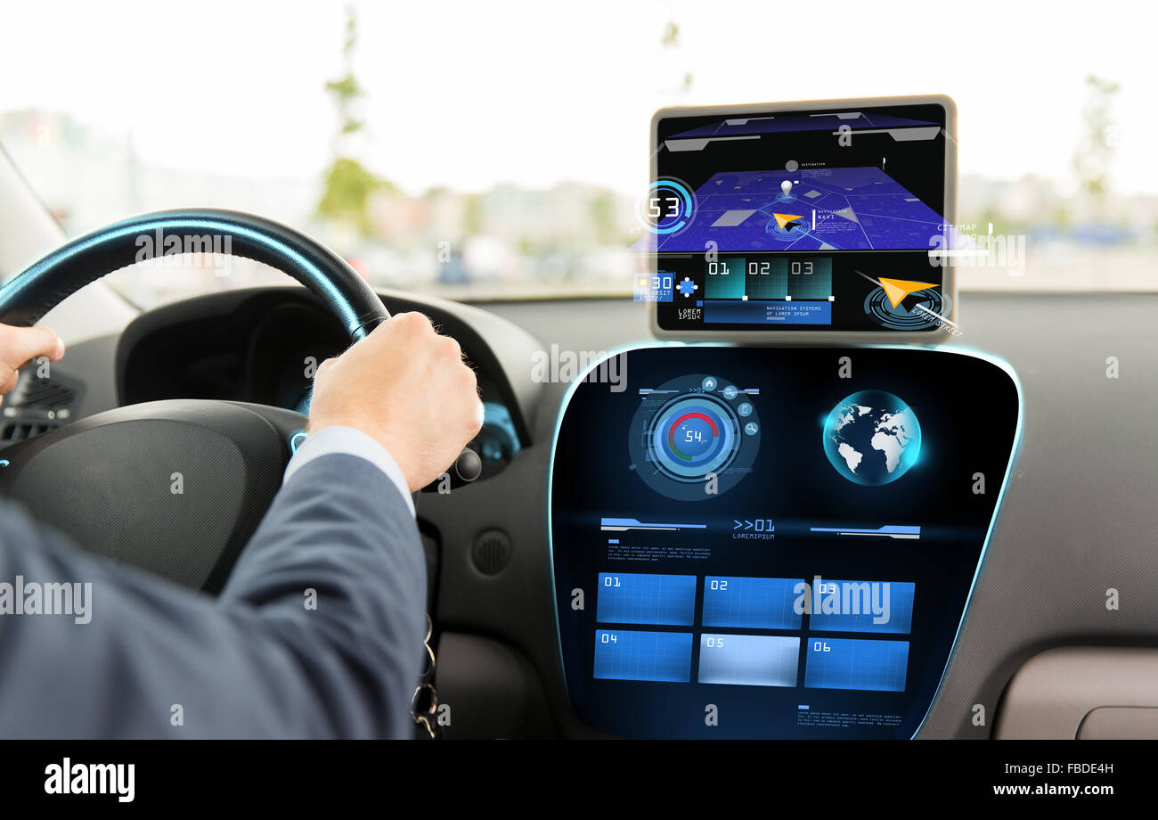 close up of man driving car with navigation system Stock Photo - Alamy