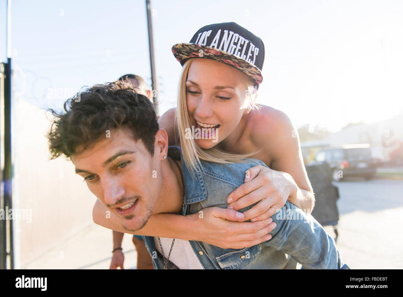 Woman riding on shoulders man hi-res stock photography and images - Alamy