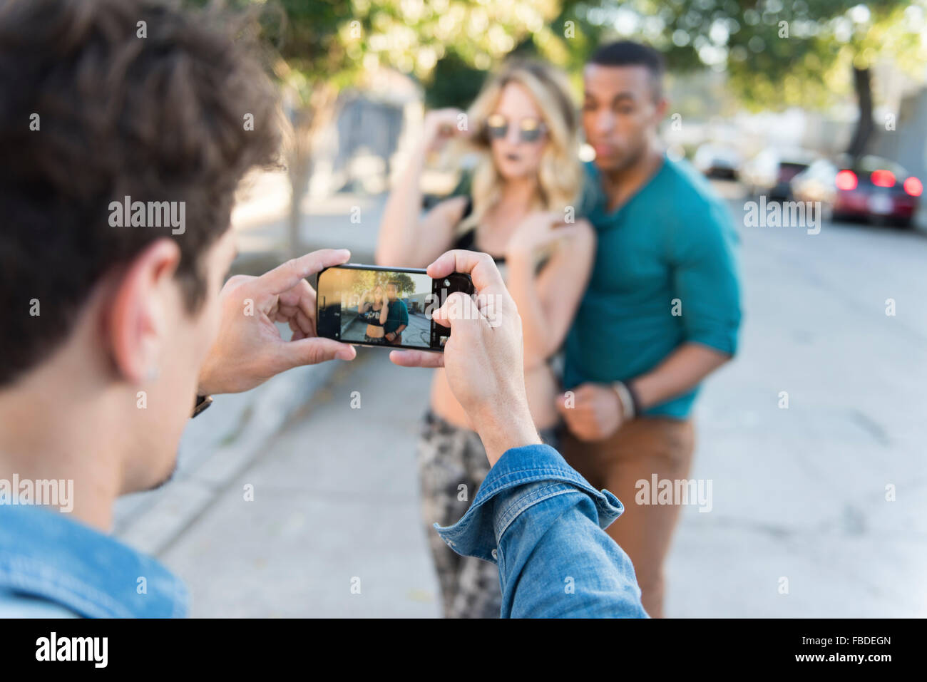 Back view man taking photograph hi-res stock photography and images - Alamy