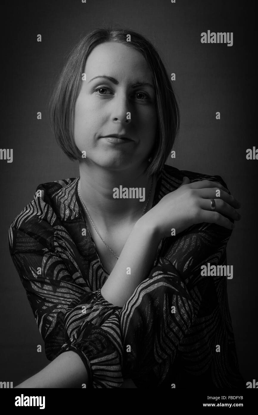 Serious young woman beautiful hi-res stock photography and images - Alamy