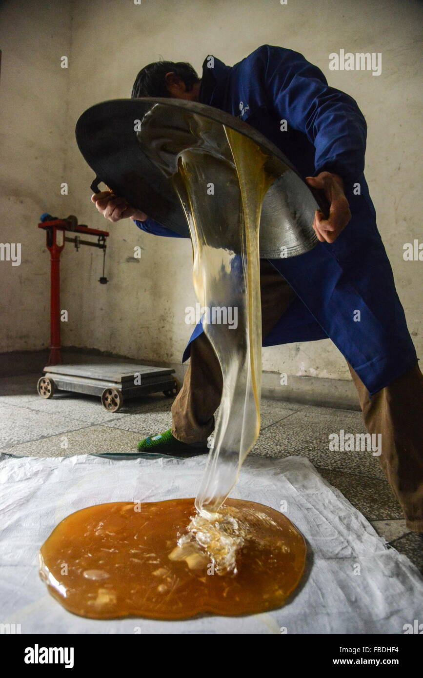 Nanchang, China's Jiangxi Province. 14th Jan, 2016. People make maltose ...