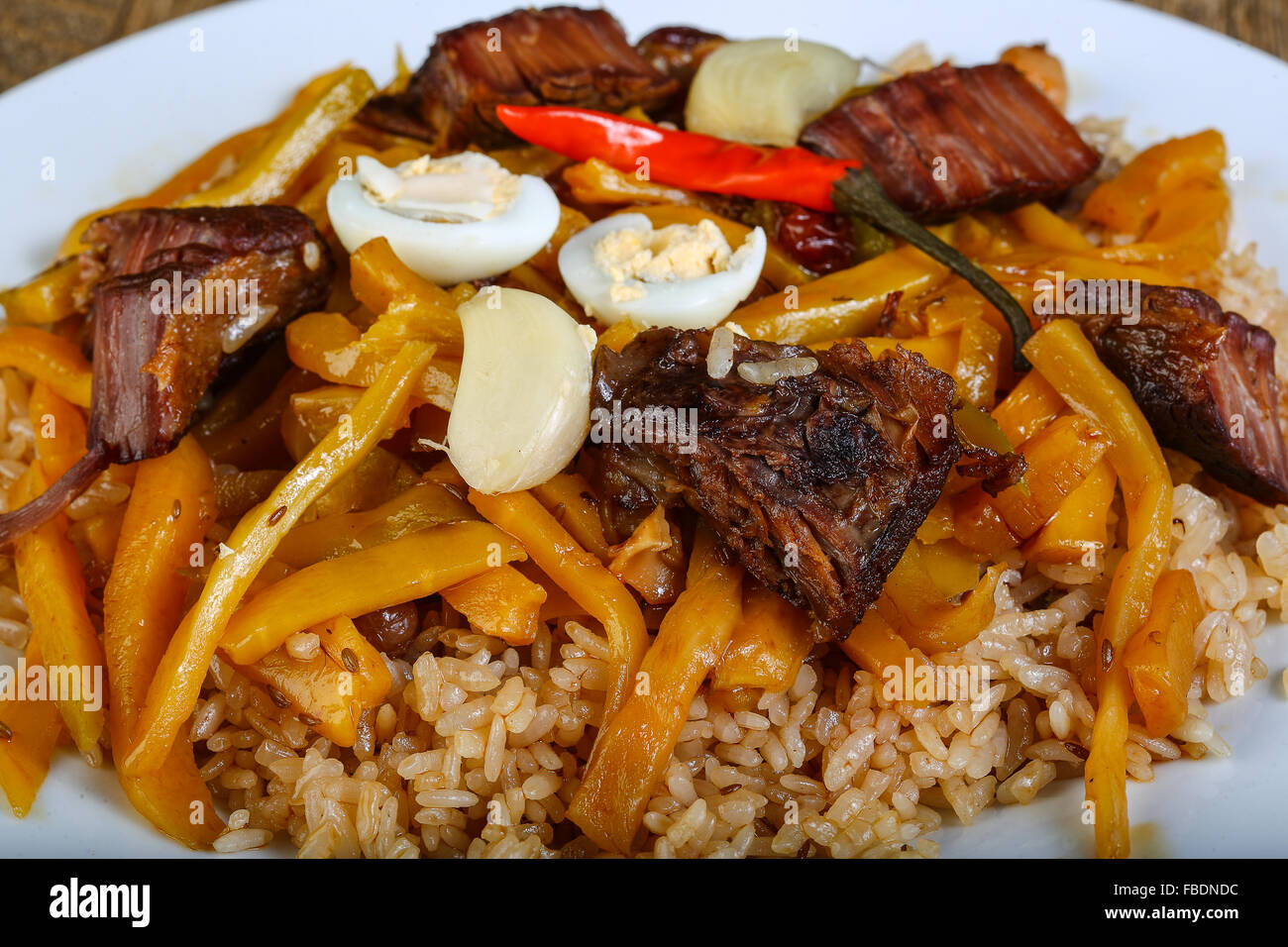 Rice with beef - Uzbek traditional cuisine Stock Photo - Alamy