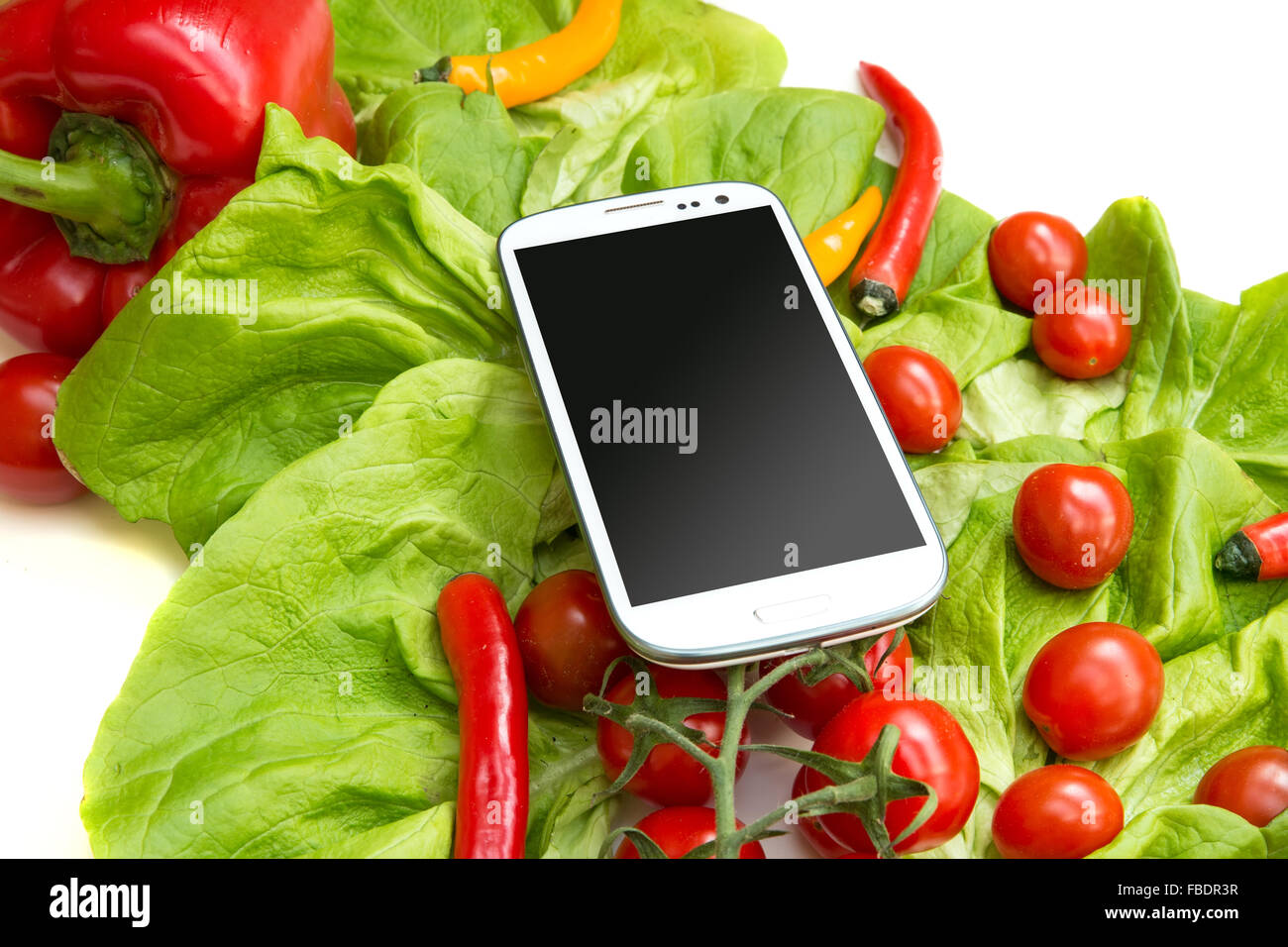 Various vegetables with a Smartphone Stock Photo - Alamy