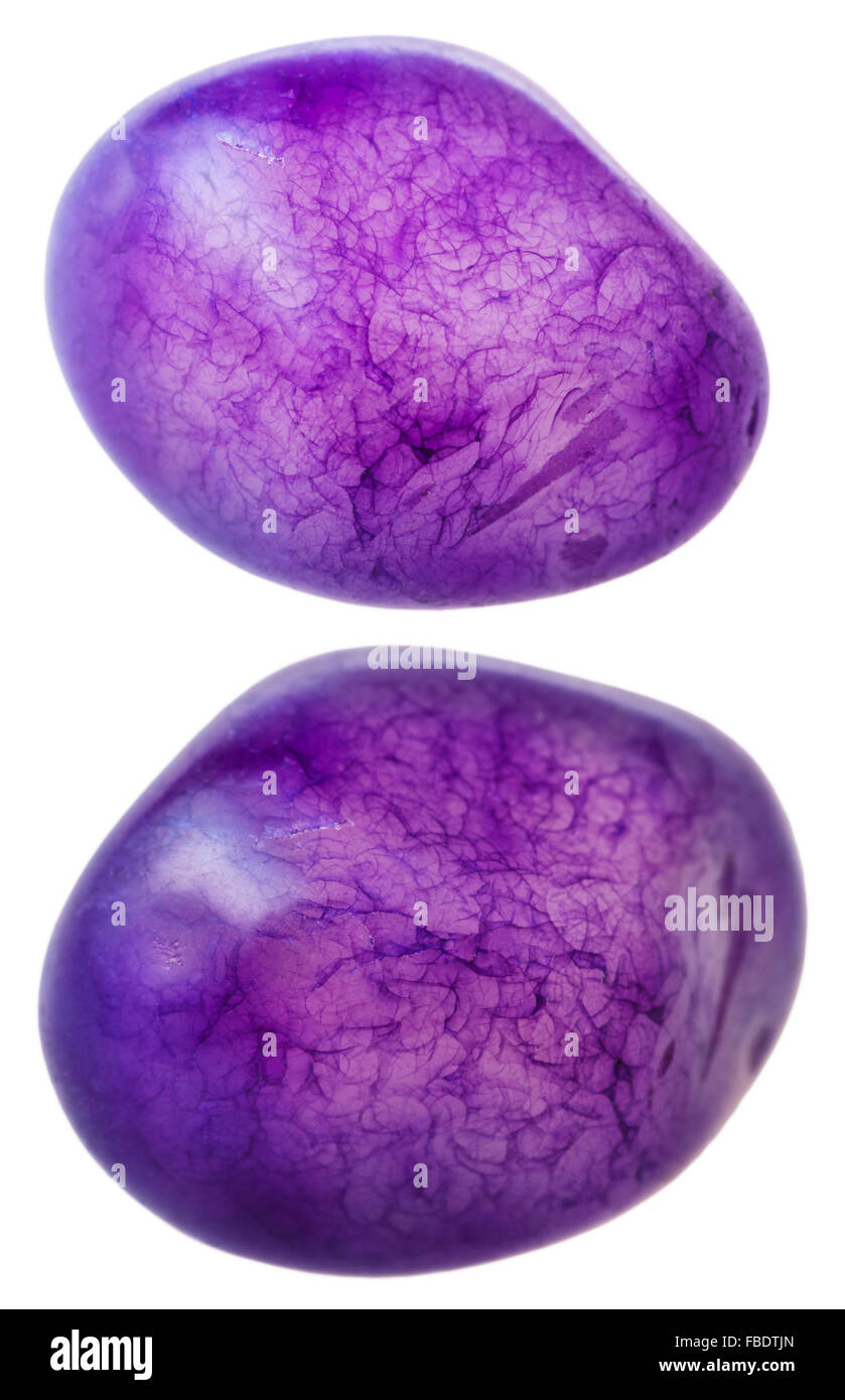 natural mineral gem stone - two violet toned quartz gemstones isolated ...