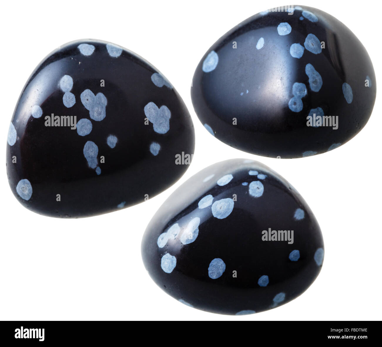 natural mineral gem stone - three snowflake obsidian gemstones isolated ...