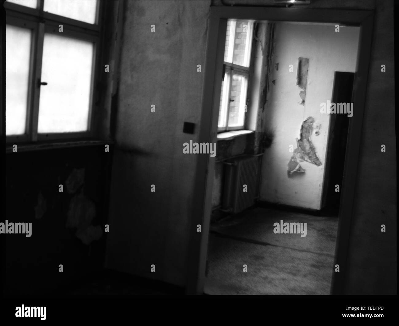 Reflection Of Damaged Wall On Mirror Stock Photo - Alamy