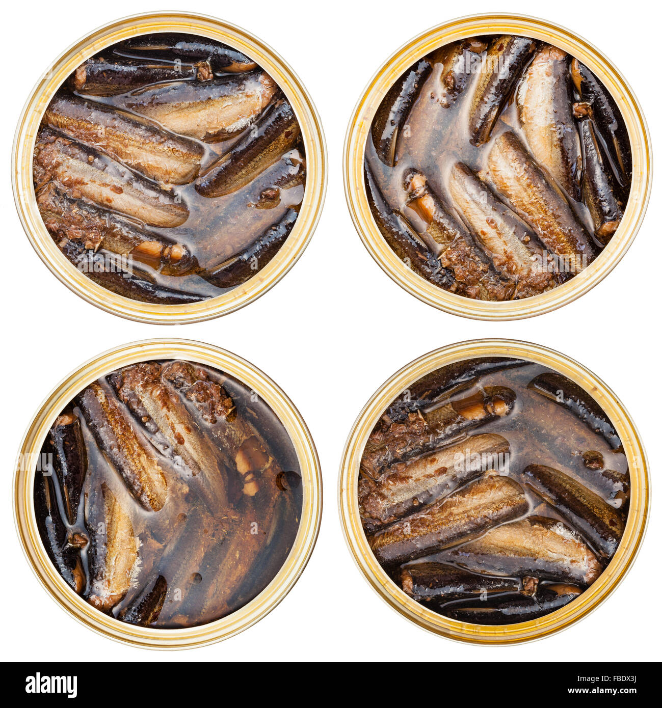 set of canned smoked sprats fish in oil in open tin isolated on white ...