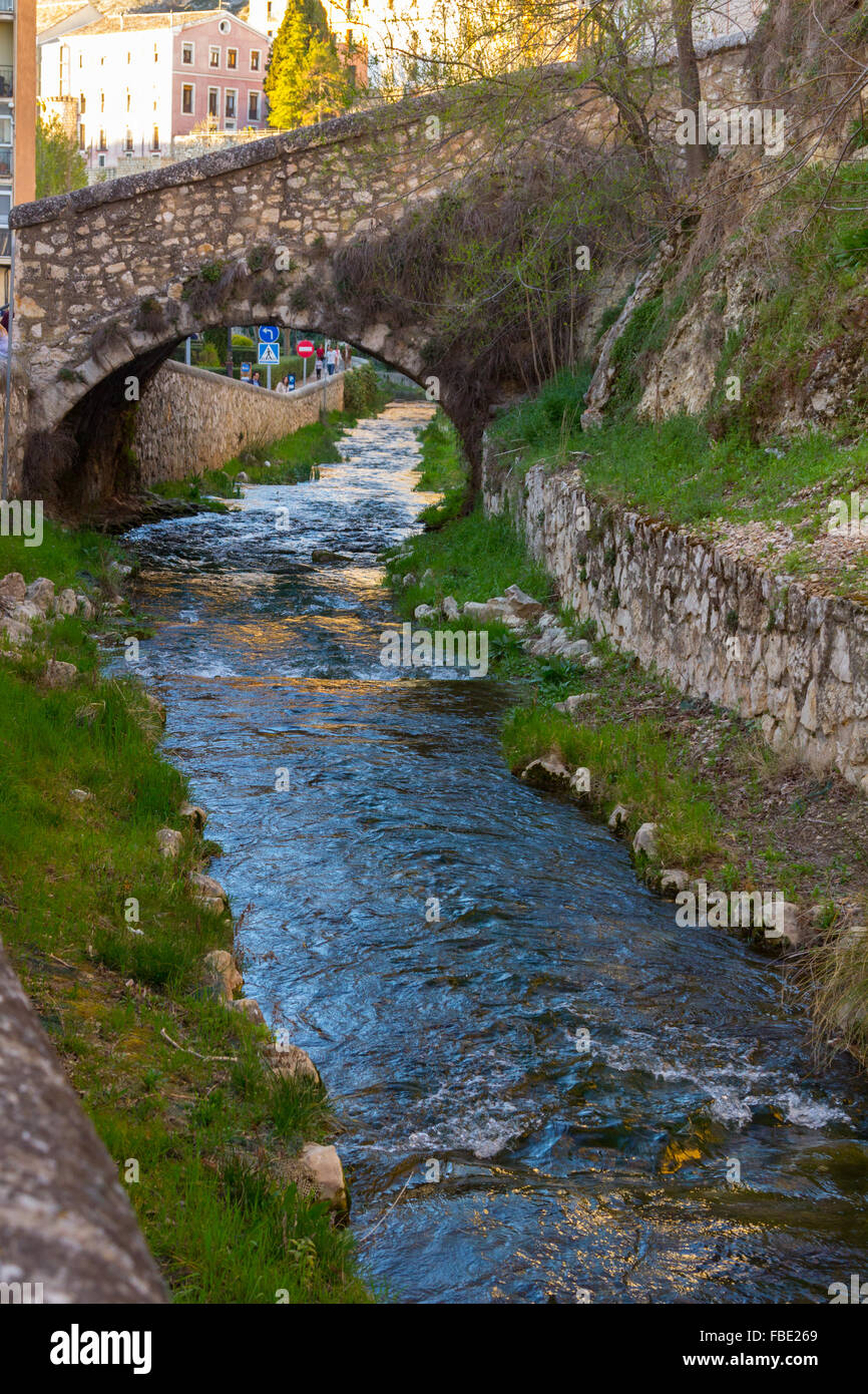 Arch stone bridge and pedestrian in the city of Cuenca, Spain Stock ...