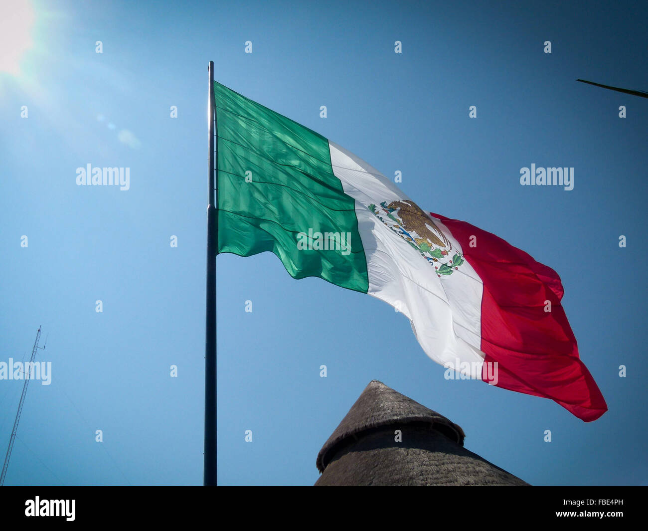 Mexican flag flying hi-res stock photography and images - Alamy