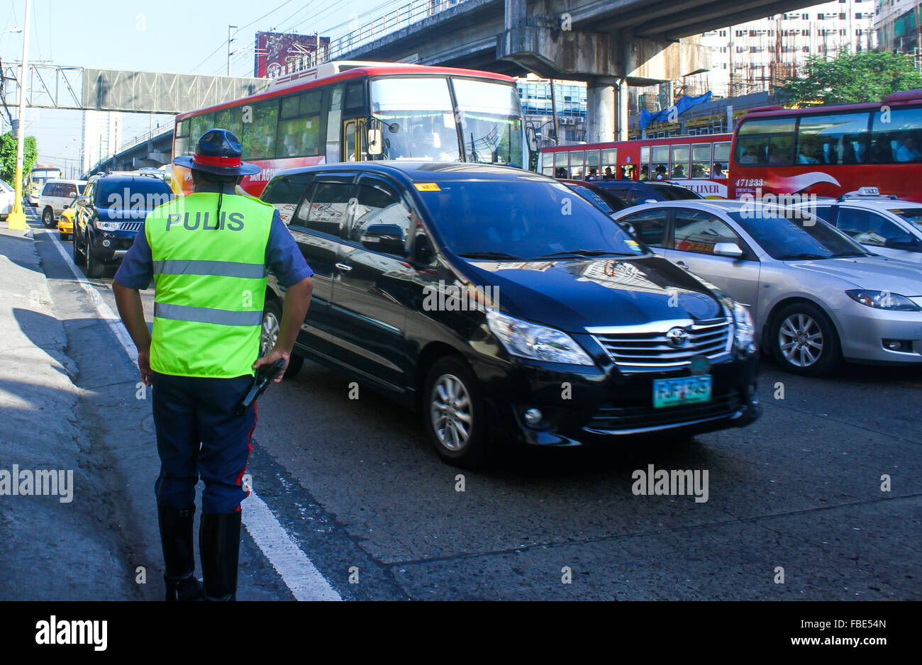 Police observing the heavy traffic for trip and road safety ...