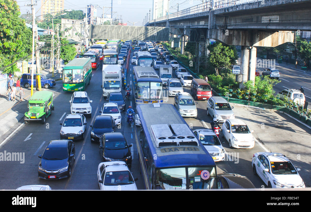 A heavy one lane road where vehicles were jammed along EDSA Highway ...