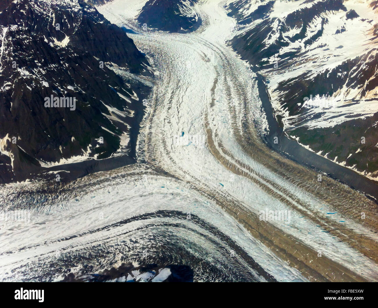 Glacier flow in Denali National Park Alaska, view from low flying plane ...