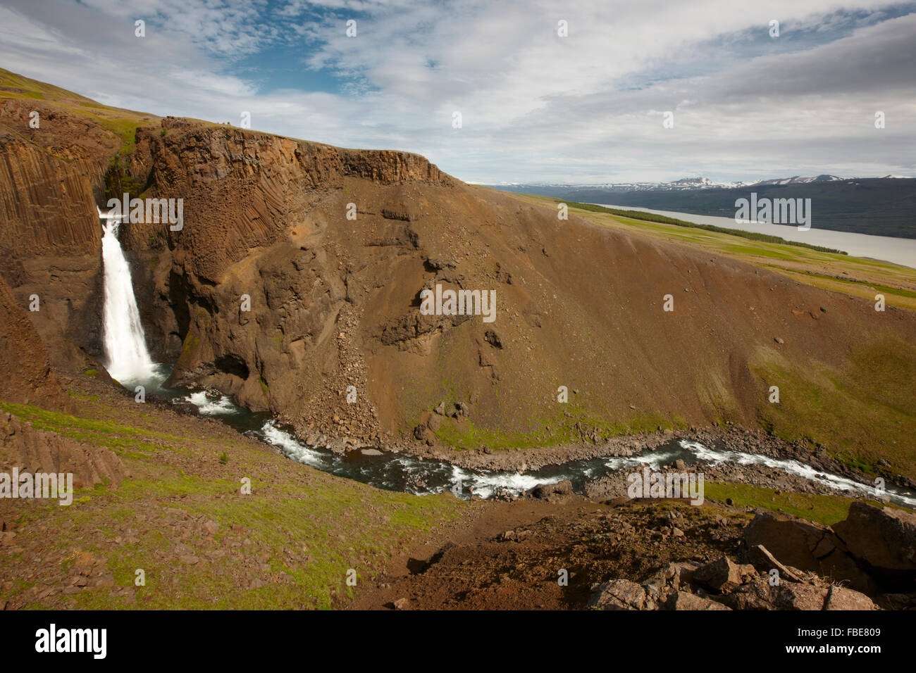 Iceland. Landscape with waterfall and basaltic rocks Stock Photo - Alamy
