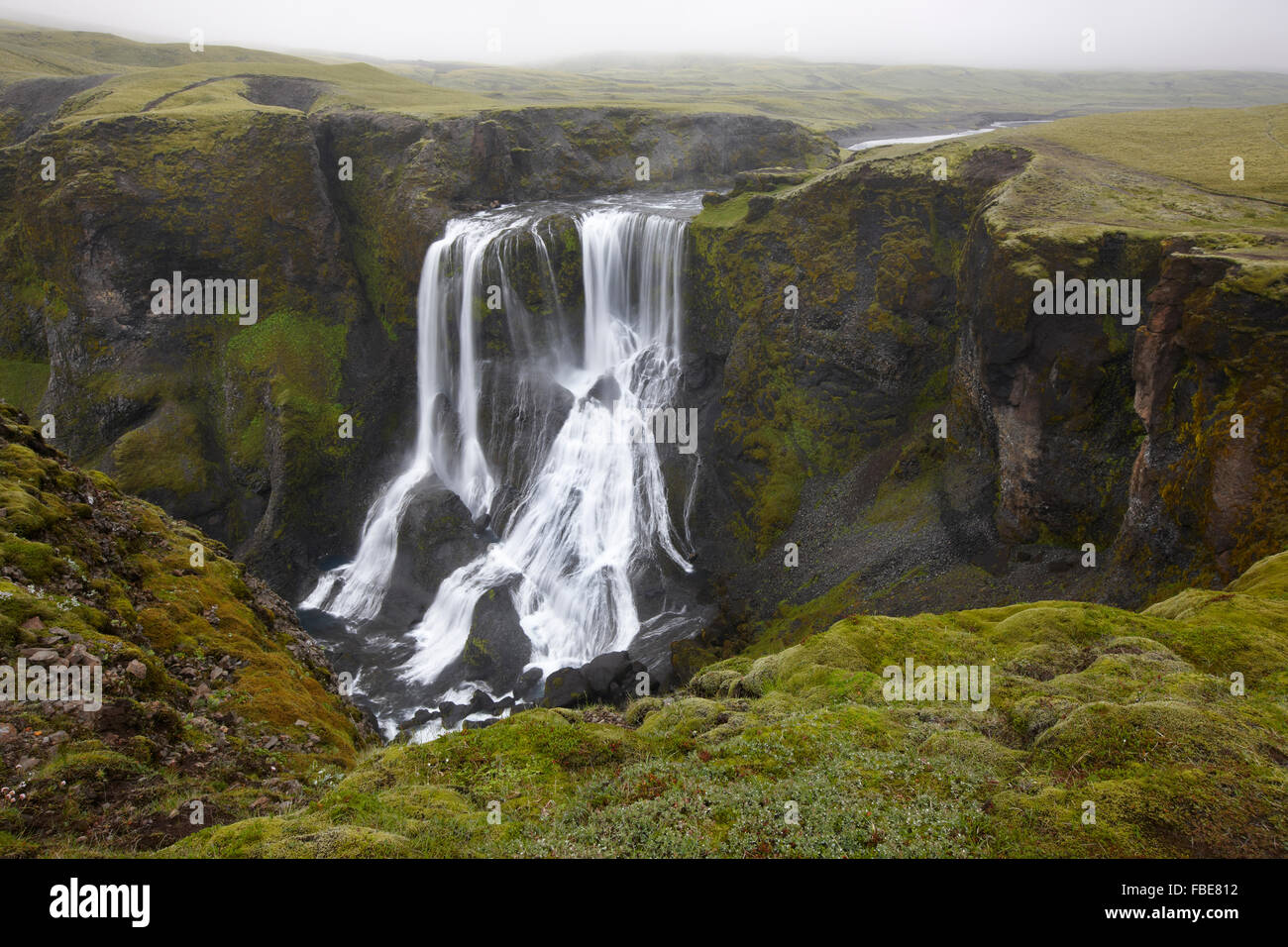 Iceland. Landscape with waterfall and basaltic rocks Stock Photo - Alamy