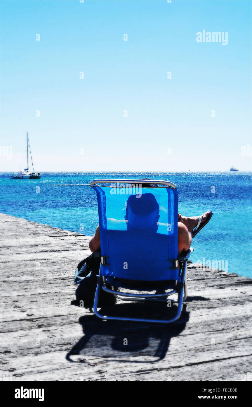 Man sunbathing hi-res stock photography and images - Alamy