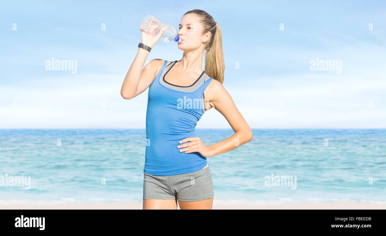 Beautiful woman water bottle beach hi-res stock photography and images ...