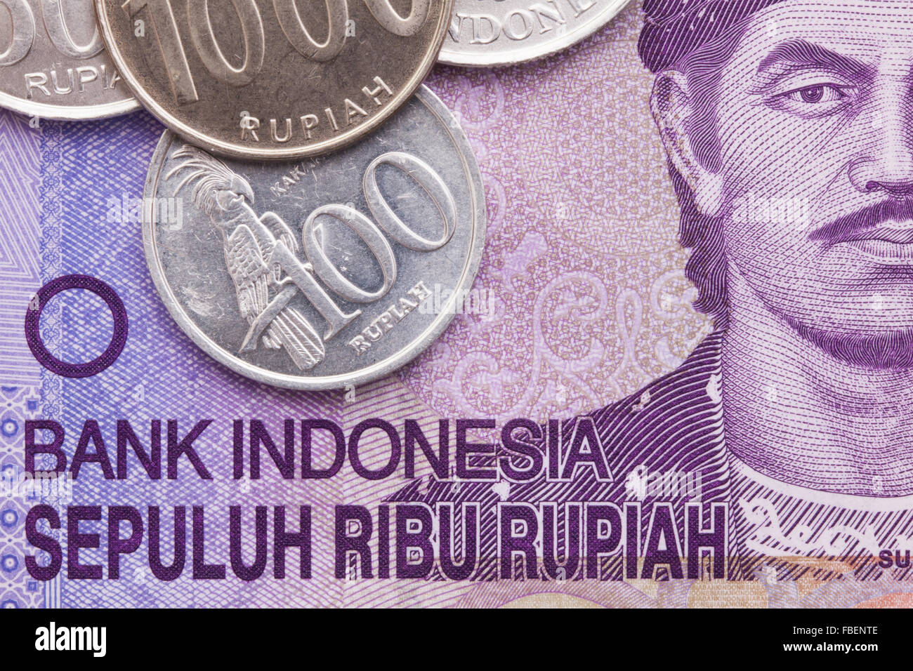 Indonesian money rupiah banknote and coins, close-up Stock Photo - Alamy