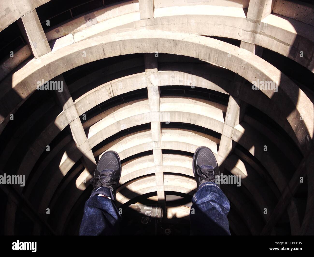 Dangling leg hi-res stock photography and images - Alamy