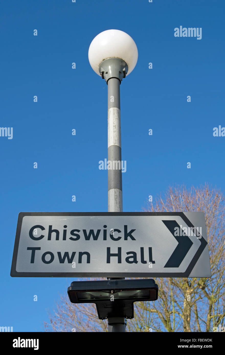 sign for chiswick town hall attached to a belisha beacon Stock Photo ...