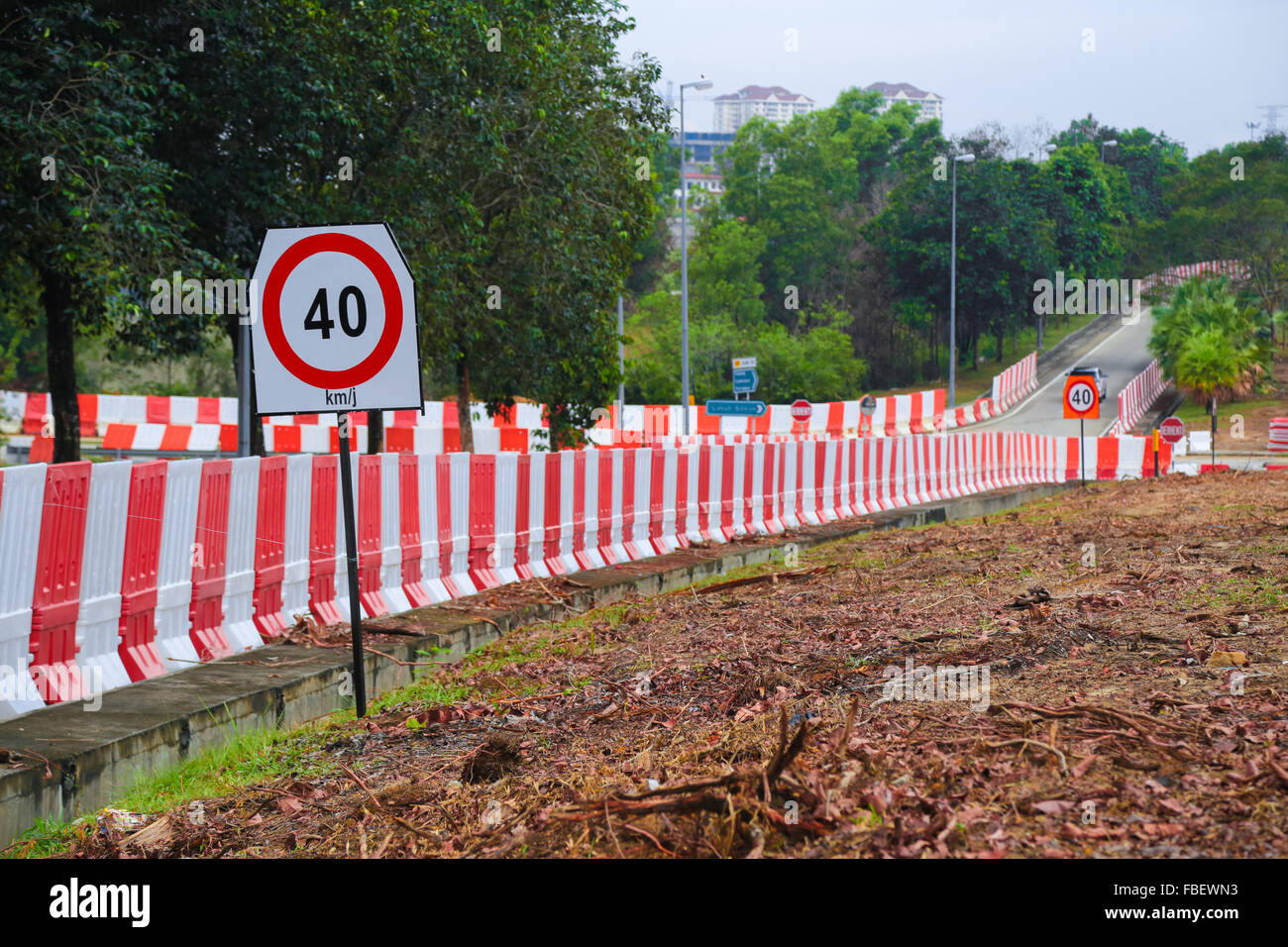 Road barriers erected along the work in progress construction area ...