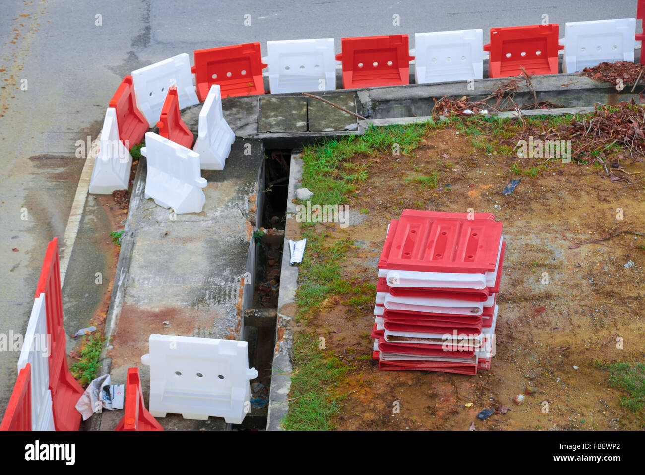 Road barriers erected along the work in progress construction area ...