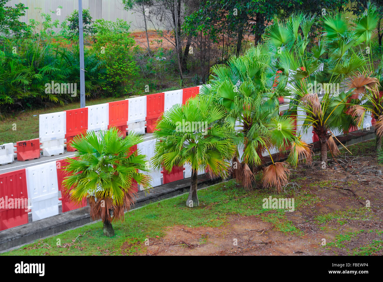 Road barriers erected along the work in progress construction area ...