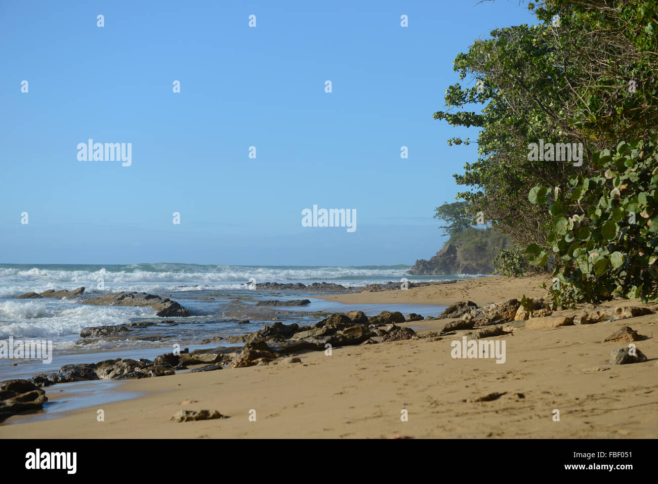Stunning view of Maria's Beach with a surfer on the horizon. Rincon ...