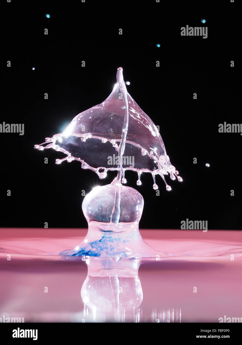 Abstract Image Of Pink Water Splashing Against Black Background Stock ...
