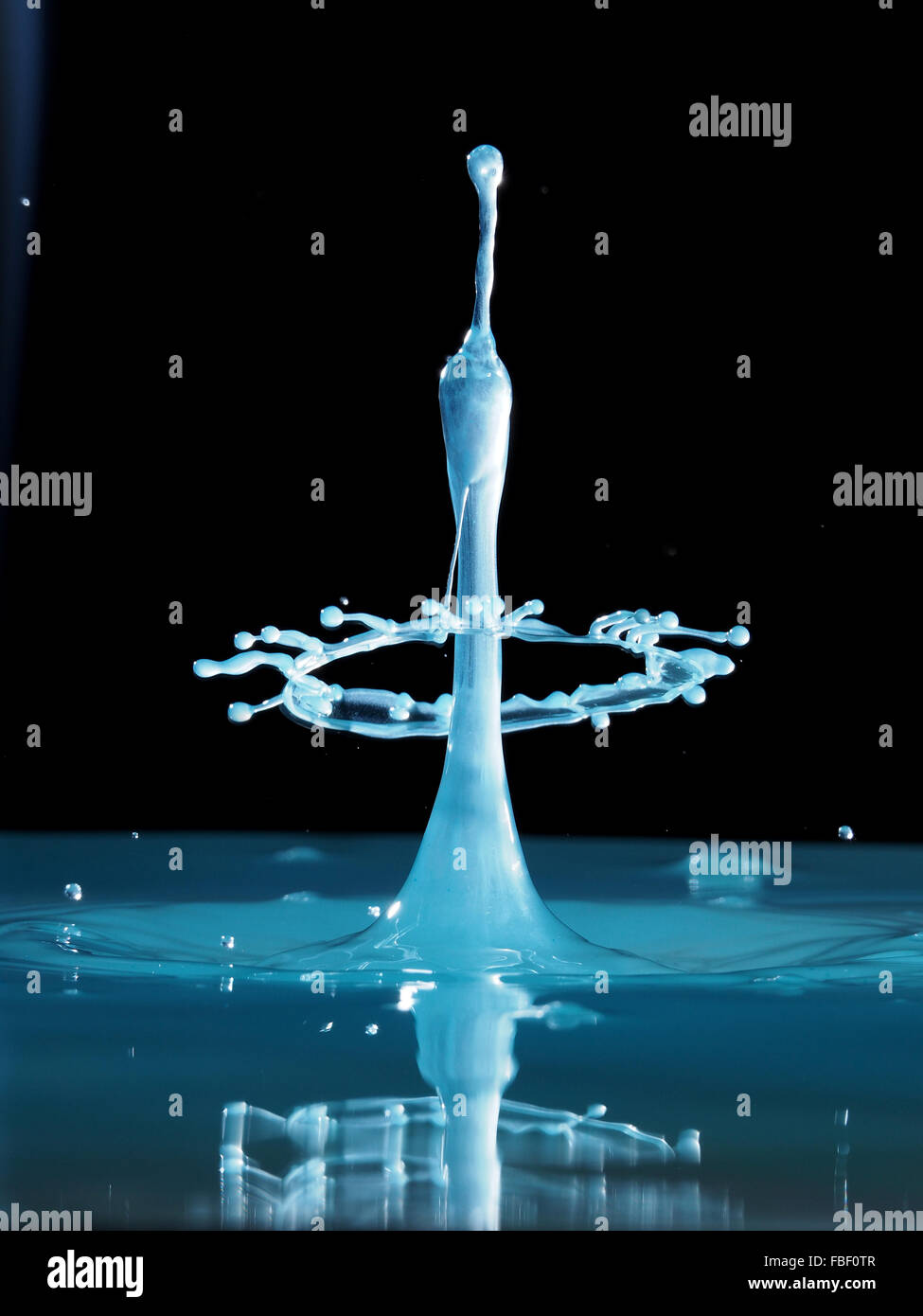 Blue water splash black background hi-res stock photography and images ...