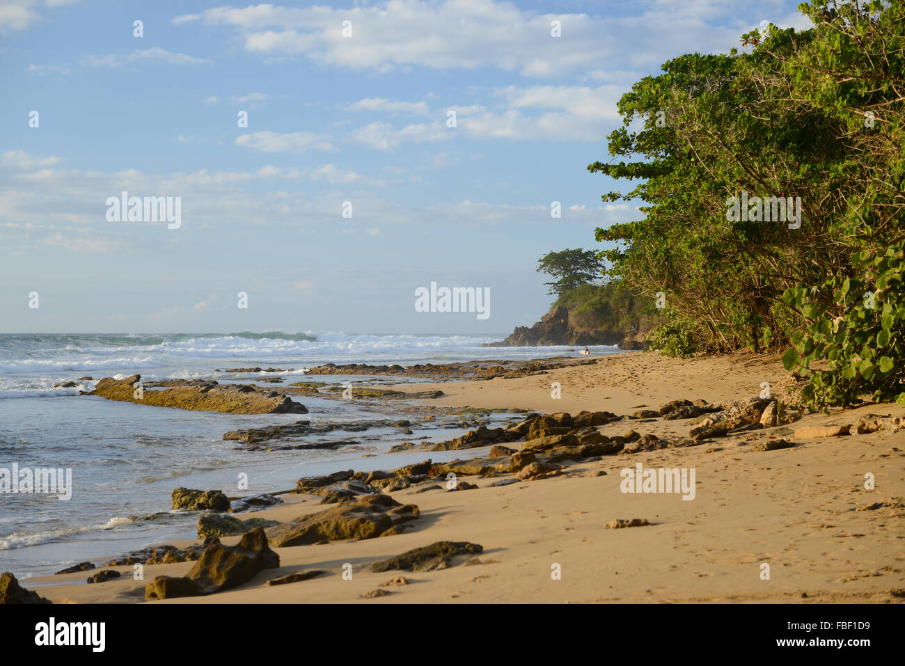 Surfer in a distance at Maria's Beach. Rincon, Puerto Rico. USA ...